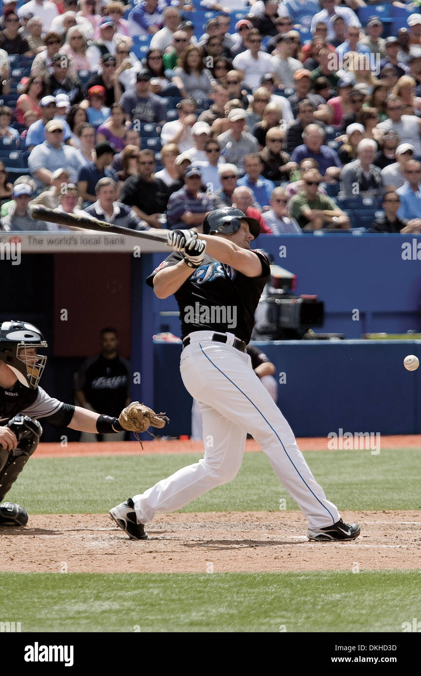 Toronto Blue Jays Adam Lind hits a line drive in the bottom of the ...