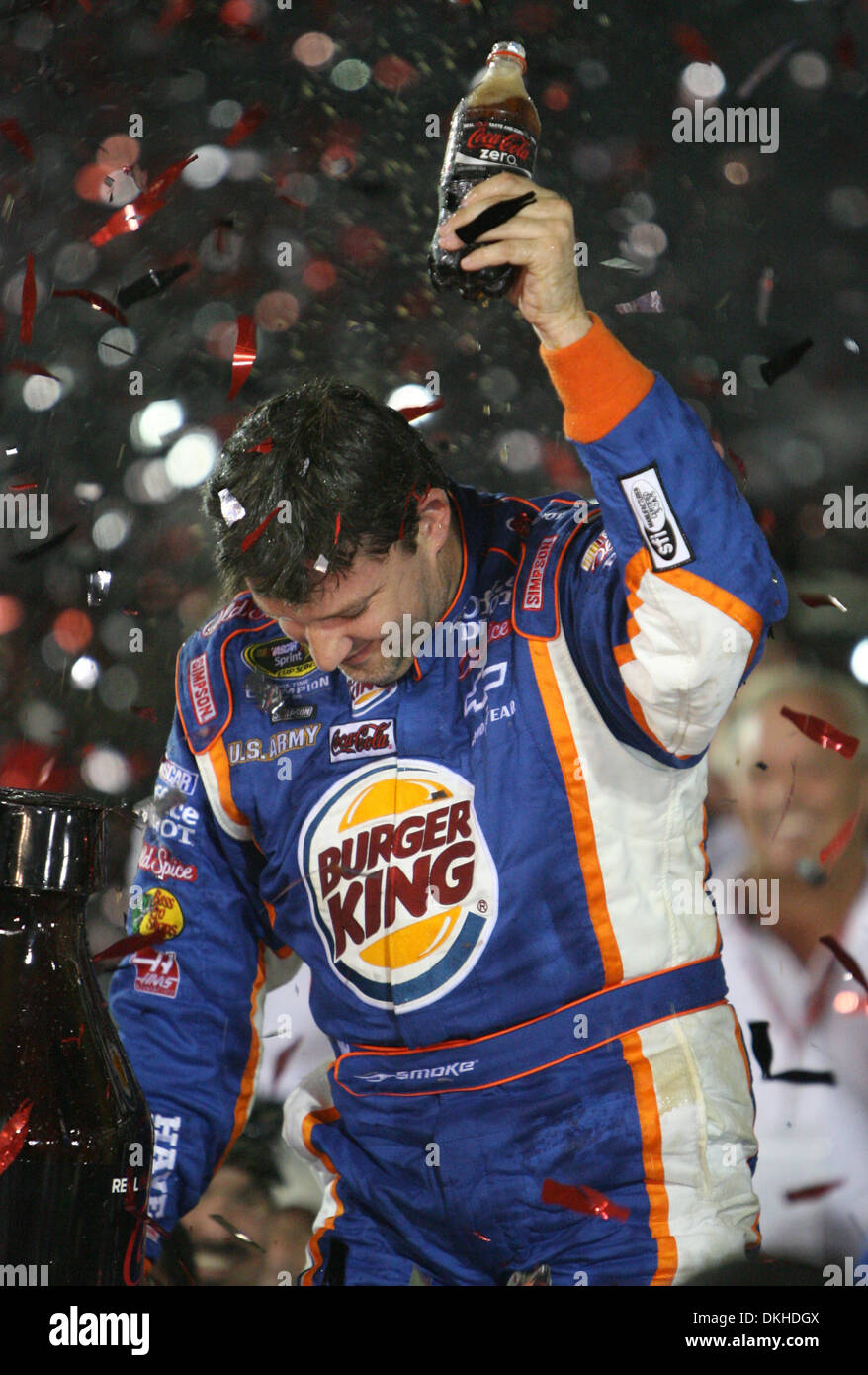 Tony Stewart Celebrates in Victory Lane after winning the NASCAR Coke ...