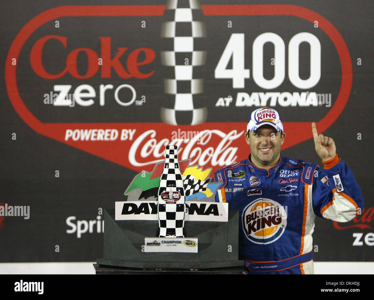 Tony Stewart Celebrates in Victory Lane after winning the NASCAR Coke ...