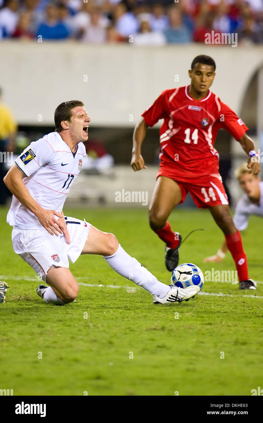United States' attacker Kenny Cooper (17) reacts to getting kicked by ...