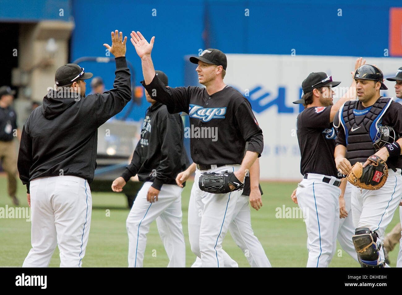 Roy ''Doc'' Halladay and the Toronto Bue Jays celebrate their 3-1 ...
