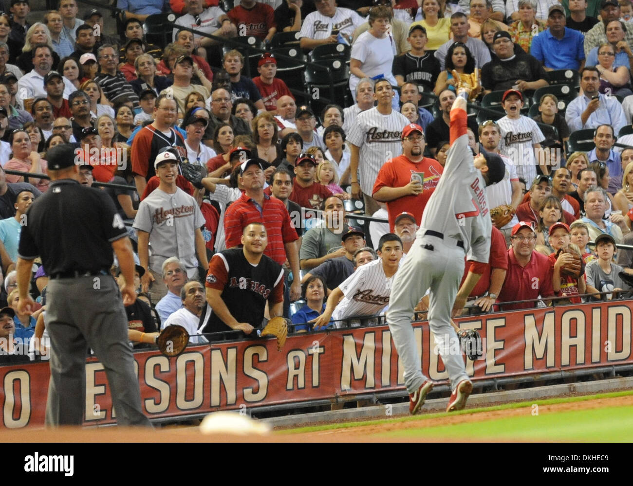 St. Louis infielder, Mark DeRosa, fields a foul ball during a National ...