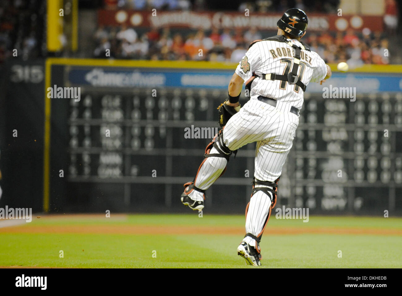 Houston catcher, Ivan Rodriguez, makes a throw to third base during a ...