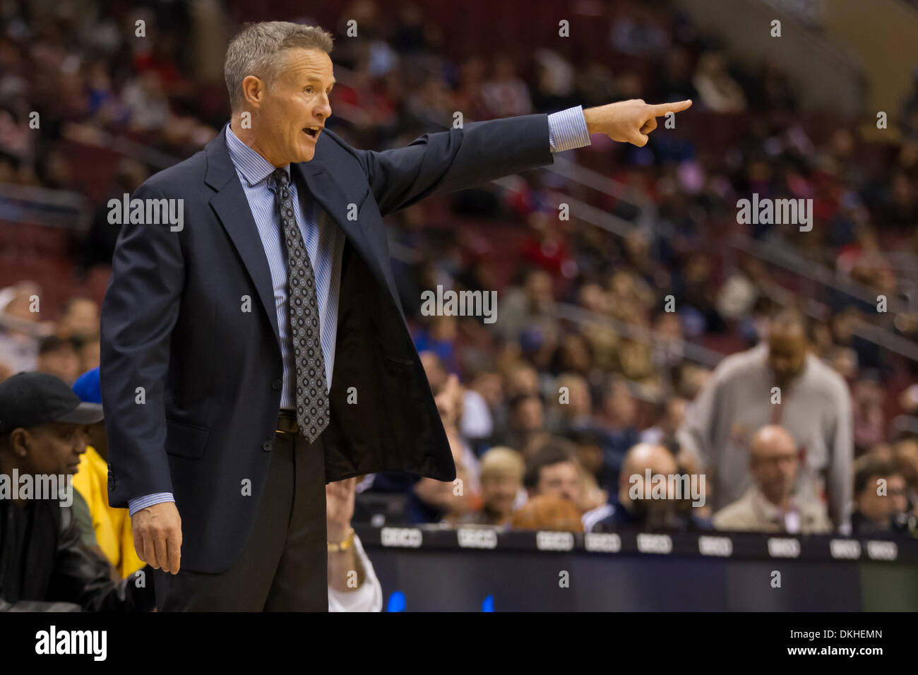 December 3, 2013: Philadelphia 76ers head coach Brett Brown directs his ...