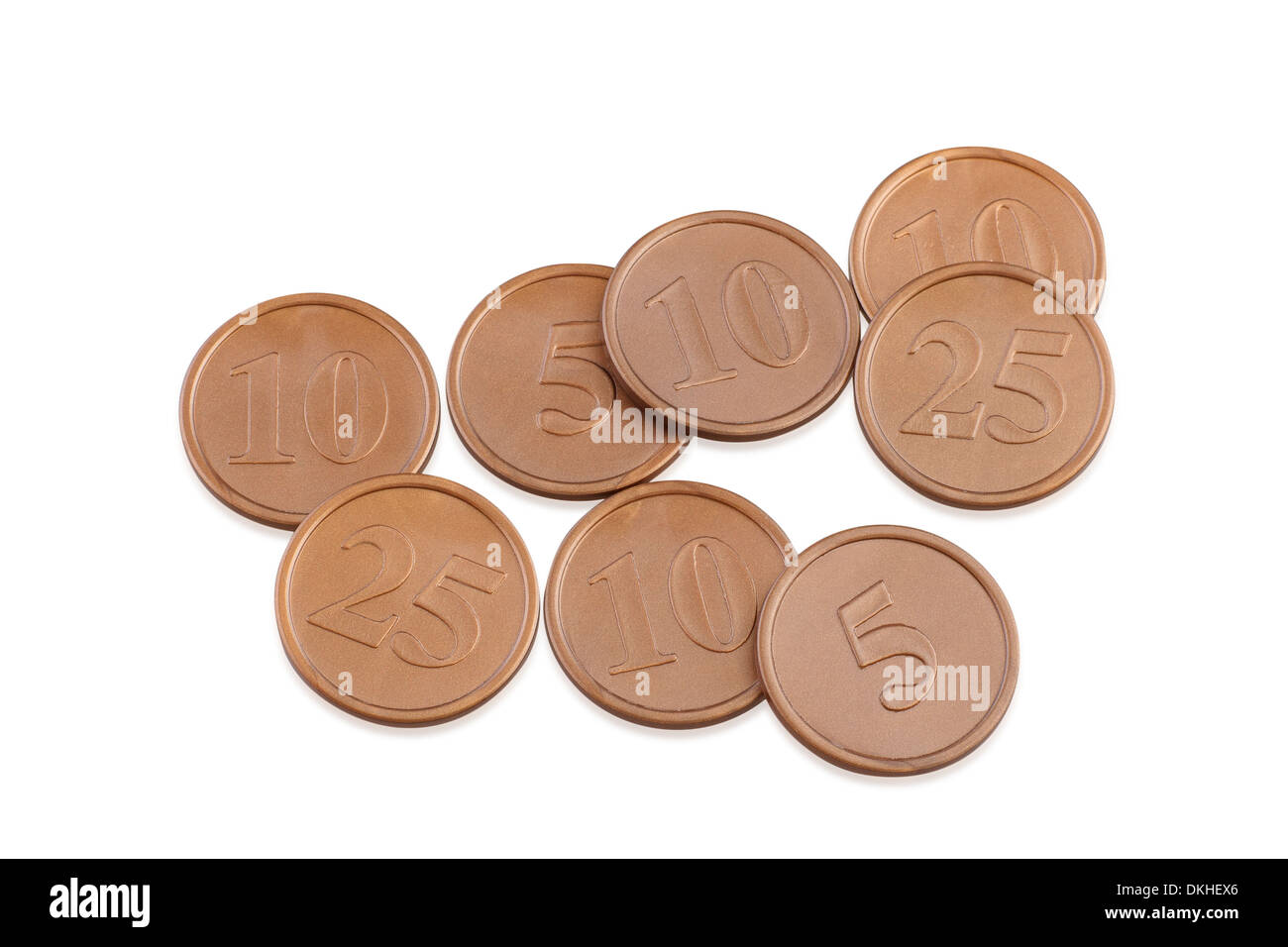 plastic coins toy isolated on white background Stock Photo - Alamy