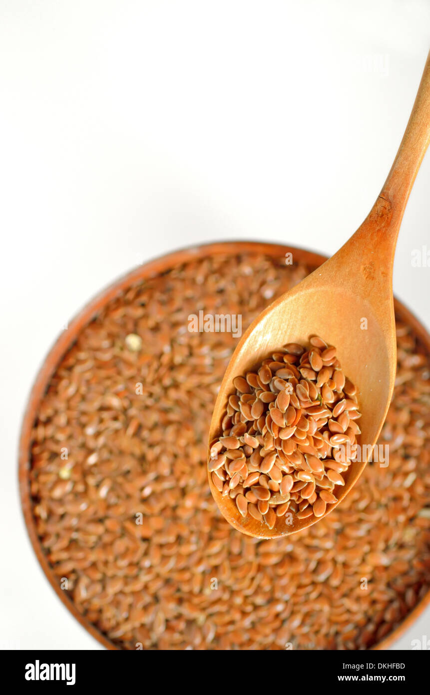 flax seeds shoot on wood, white background Stock Photo - Alamy