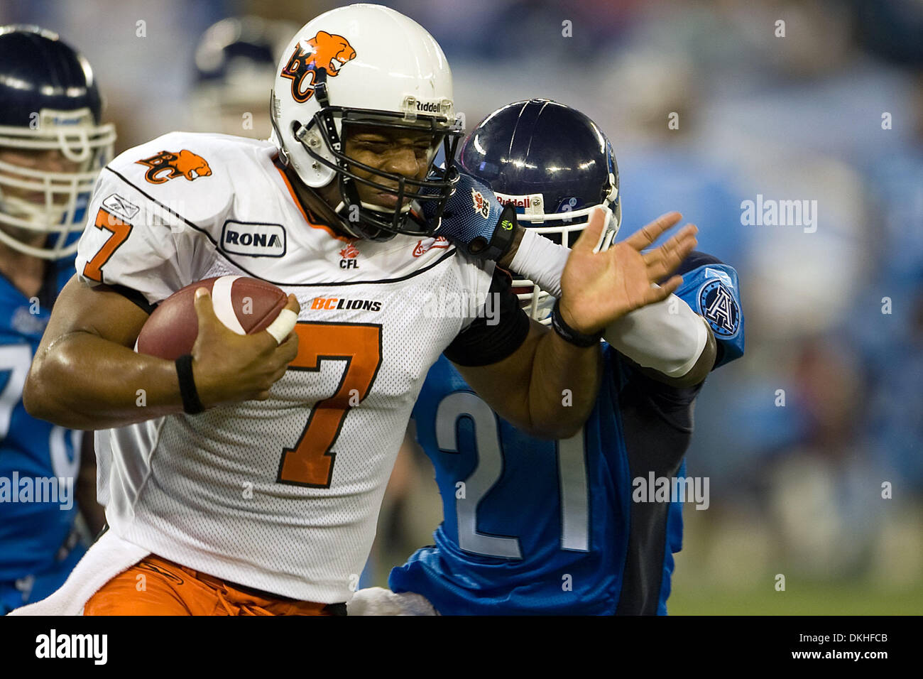 Toronto Argonauts defensive back Lin-J Shell #21 grabs the face mask of ...