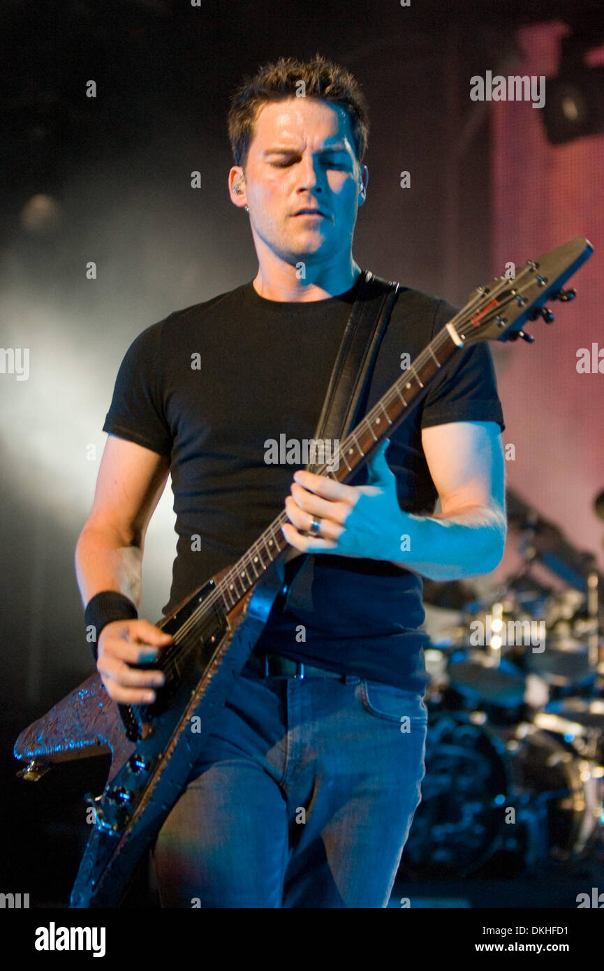 14 August 2009: Nickelback lead guitarist Ryan Peake performs onstage ...