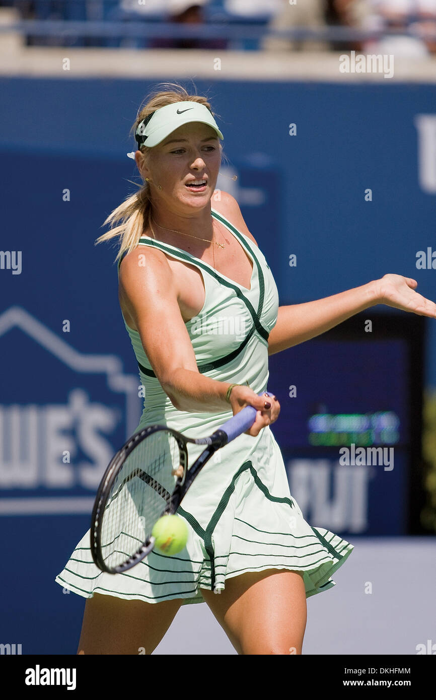 Maria Sharapova of Russia returns a forehand hit to Sybille Bammer of ...