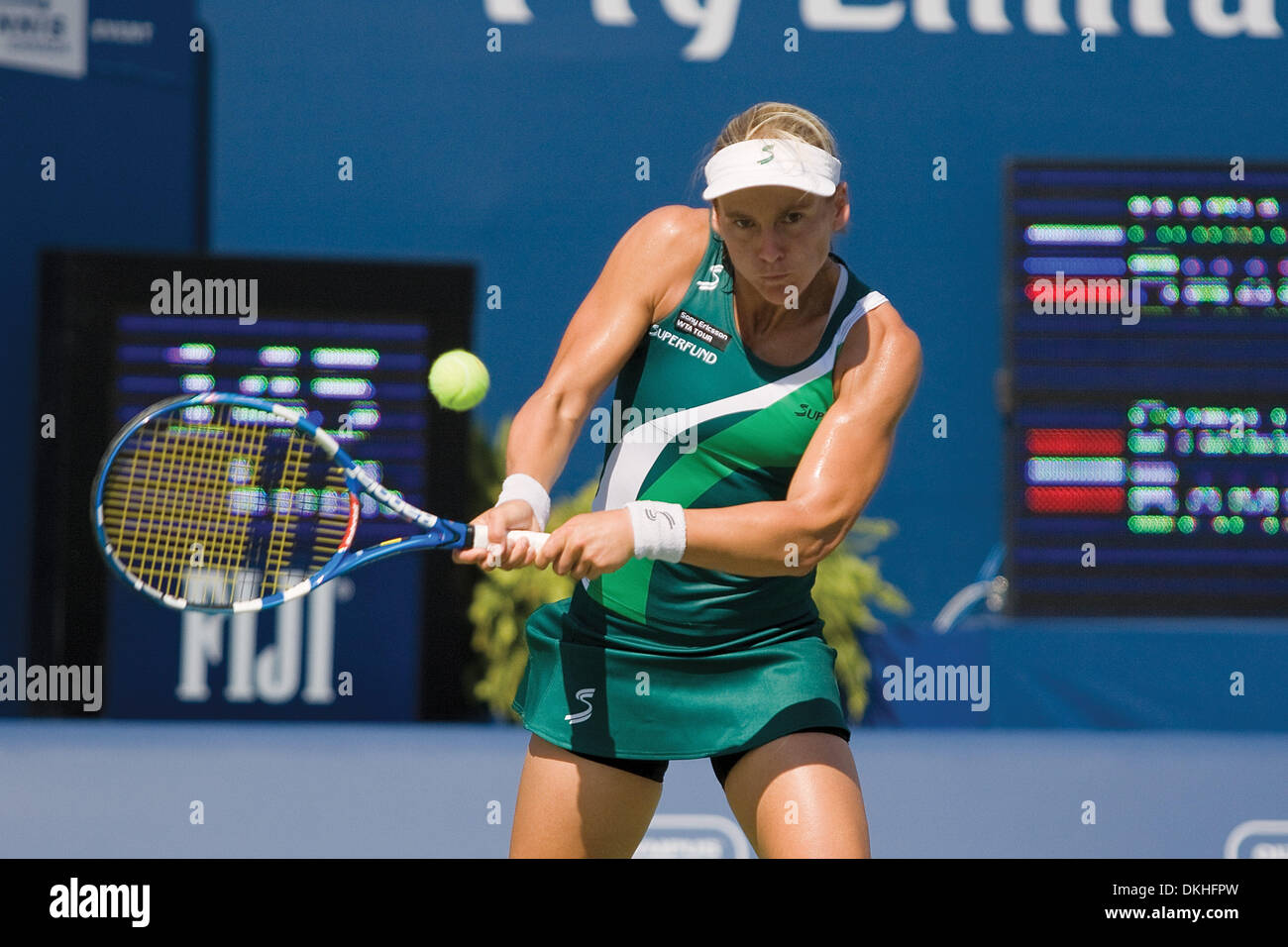 Sybille Bammer of Austria returns a backhand hit to Maria Sharapova of ...