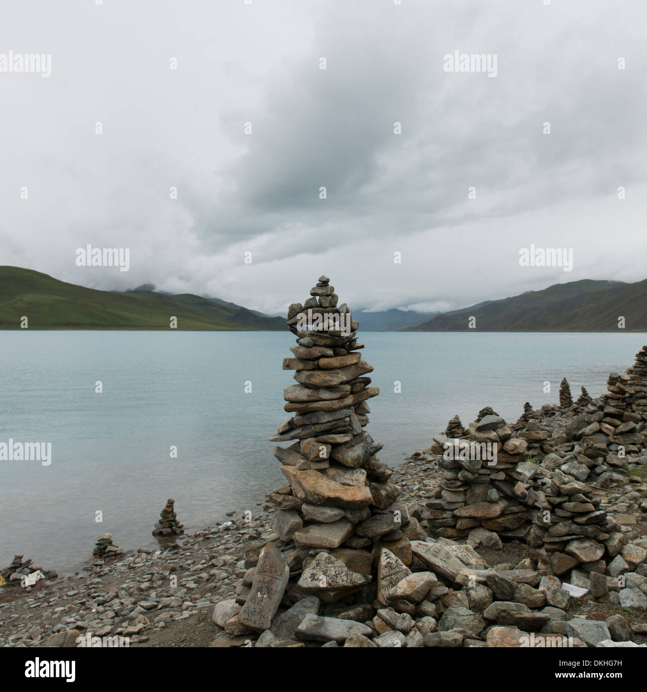 Stacks of stones at the lakeside, Yamdrok Lake, Nagarze, Shannan, Tibet ...