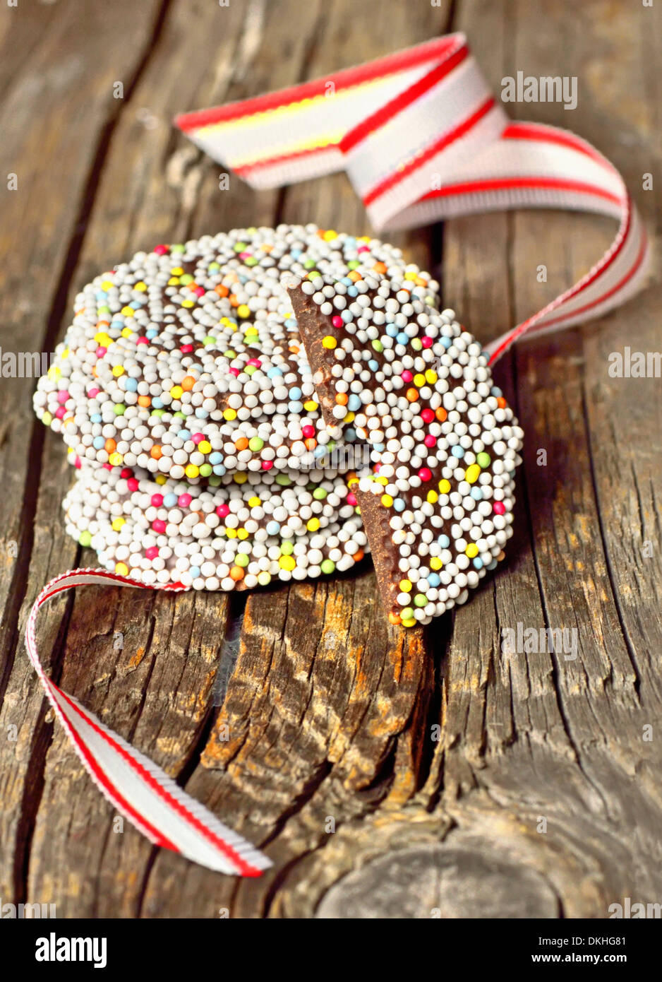Christmas chocolate Sprinkle and ribbon Stock Photo - Alamy