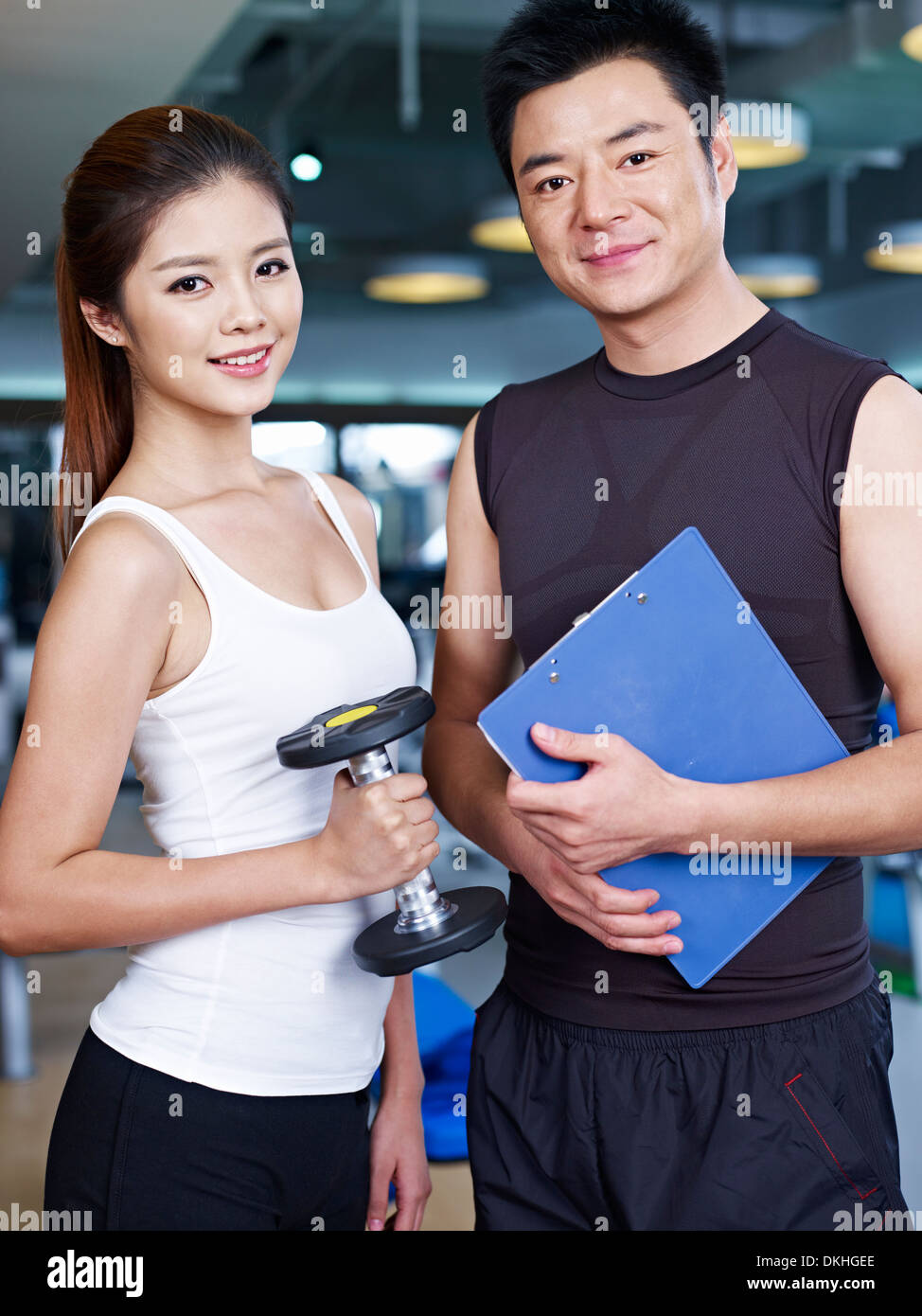 man and woman in gym Stock Photo - Alamy