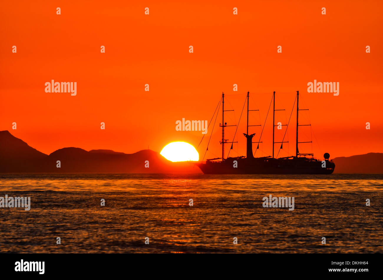 Sailing at sunset Stock Photo - Alamy
