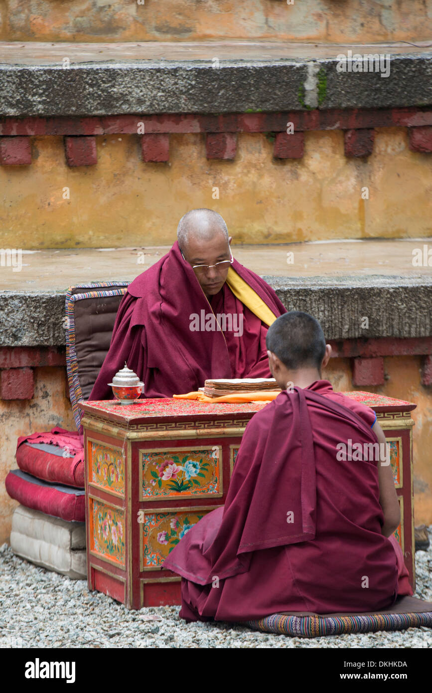 Buddhist monk reciting teachings of Buddha to his student in Sera ...