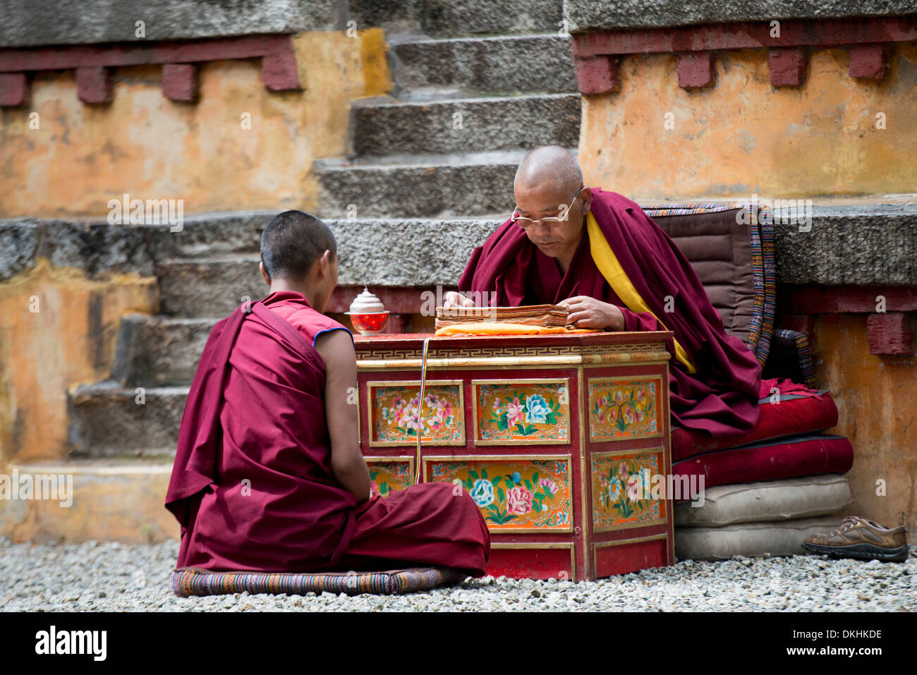 Buddhist monk reciting teachings of Buddha to his student in Sera ...