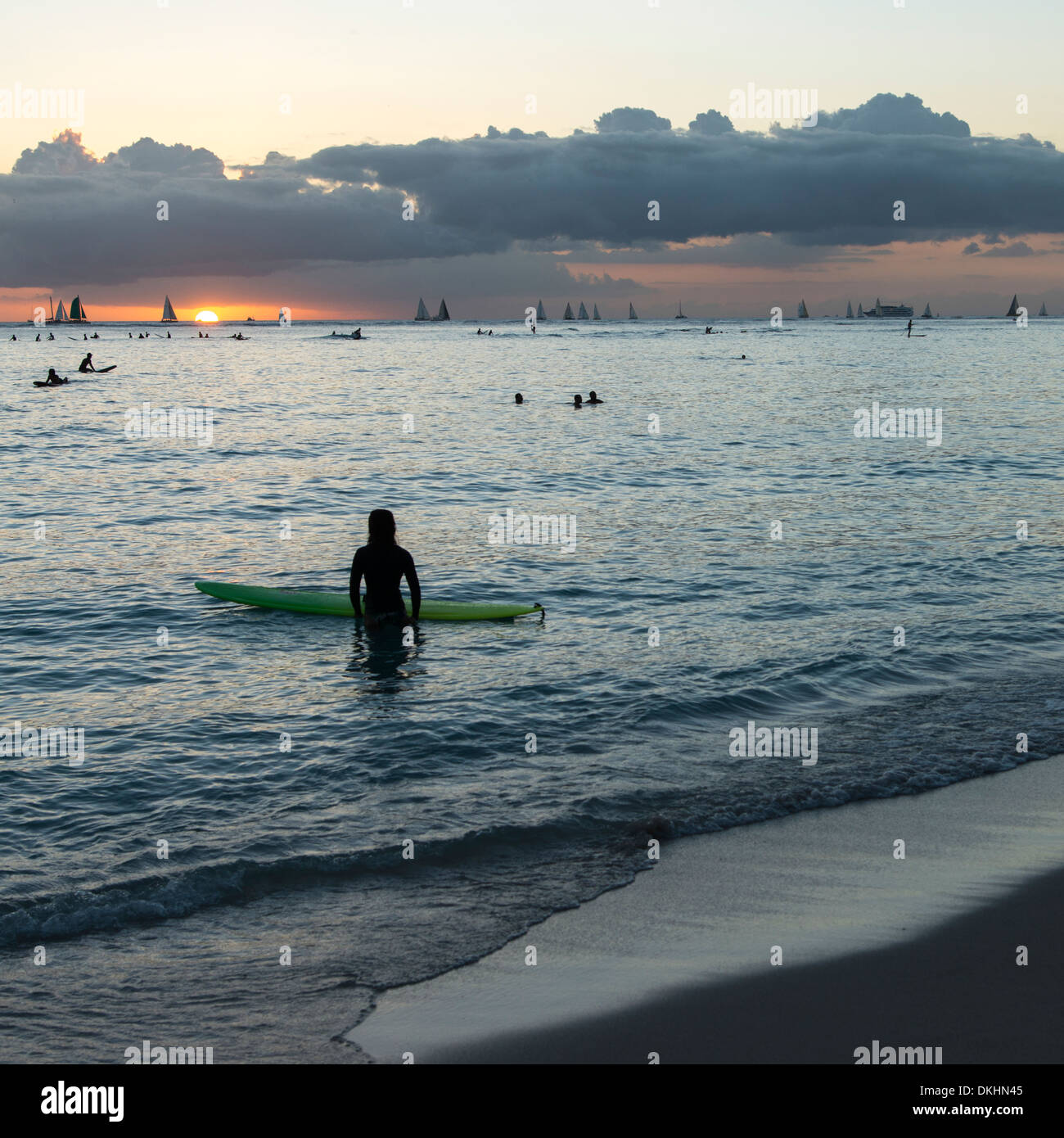Sunset beach honolulu surfing hi-res stock photography and images - Alamy