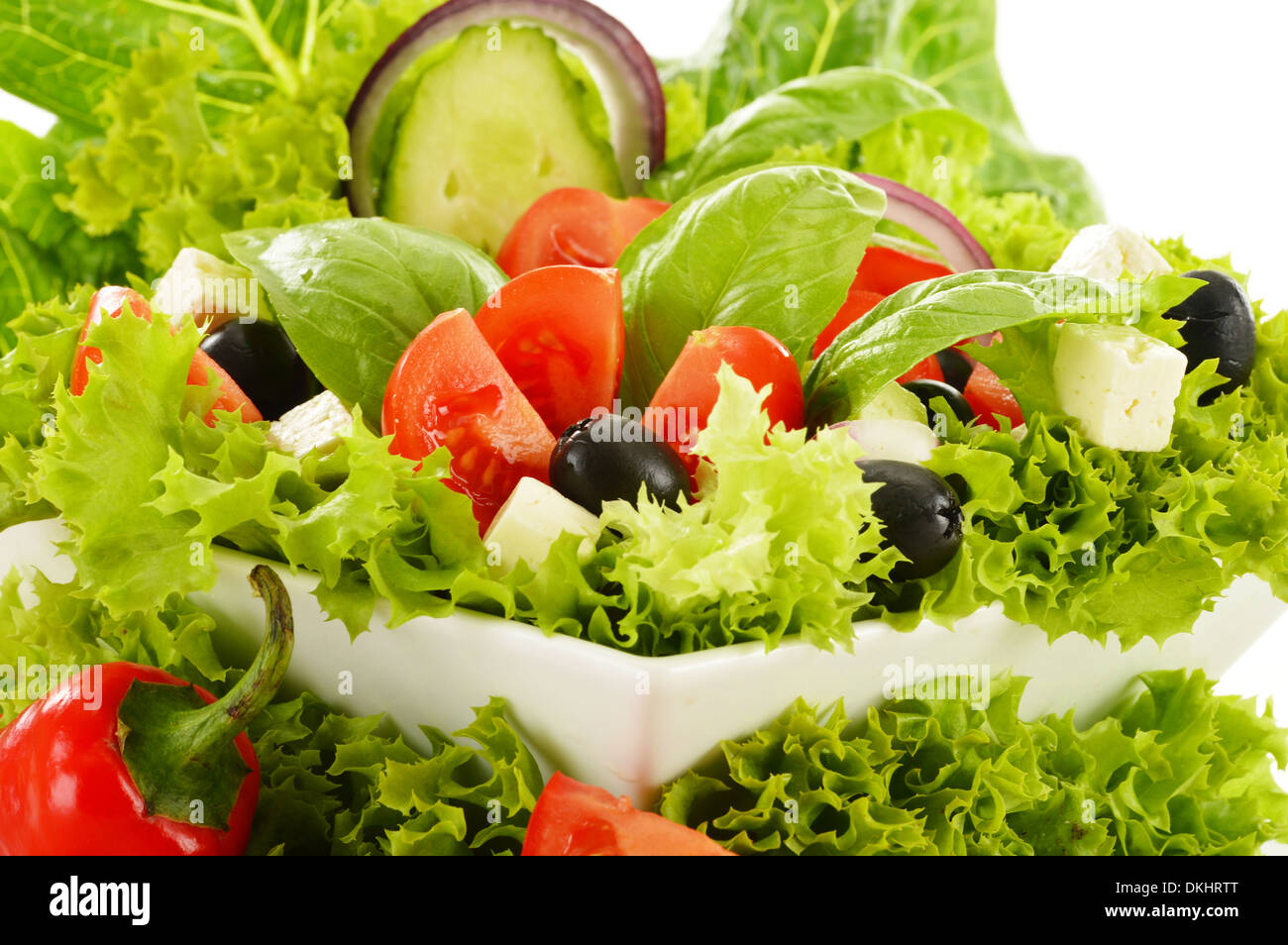 Vegetable salad bowl isolated on white background Stock Photo - Alamy