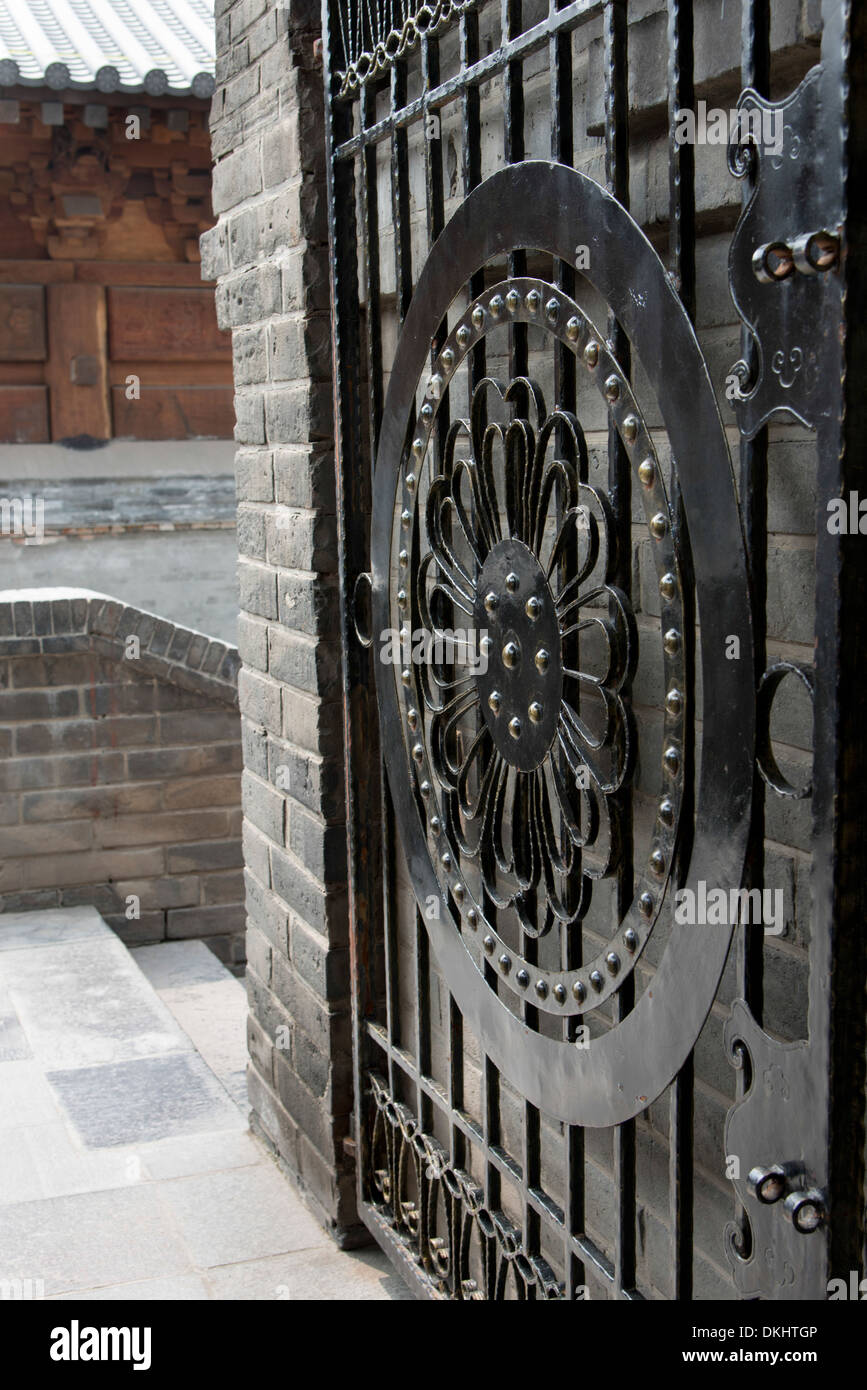 Decorated iron gate and steps at Xian, Shaanxi, China Stock Photo - Alamy