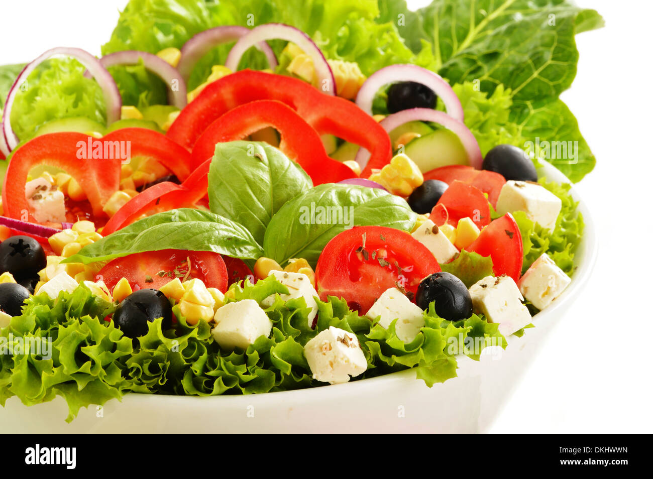 Vegetable salad bowl isolated on white background Stock Photo - Alamy