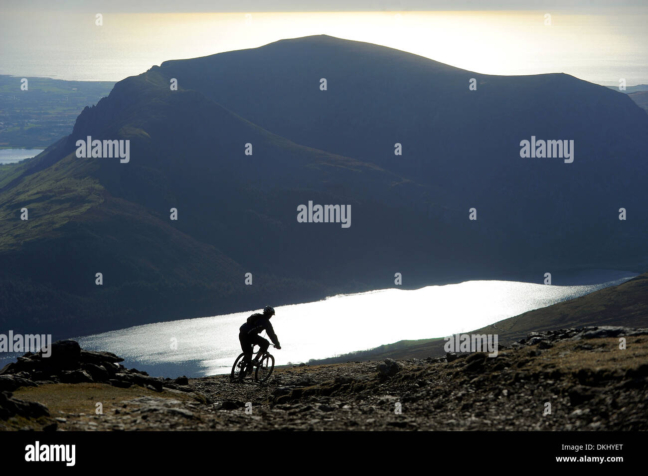 A mountain biker rides down the Rangers Path from the summit of Snowdon ...