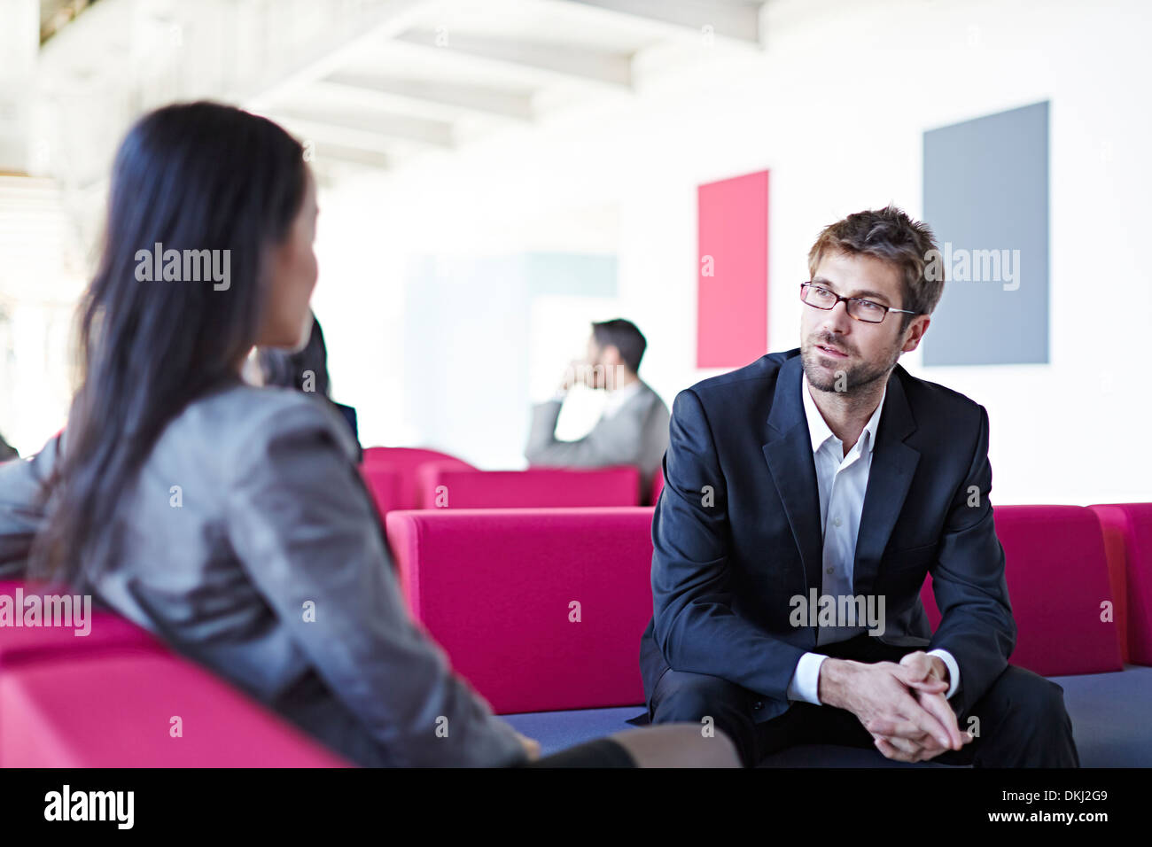 Business people talking in office Stock Photo - Alamy