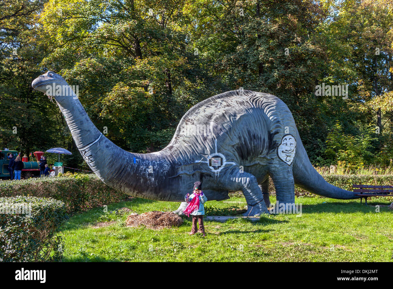 Child and giant prehistoric dinosaur model at Spree Park (or Kulturpark ...