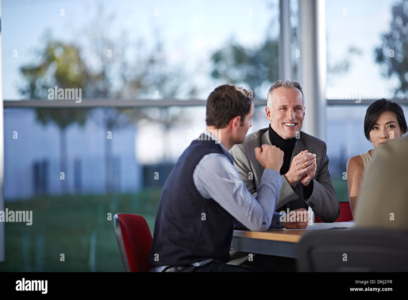 Business people talking in meeting Stock Photo - Alamy