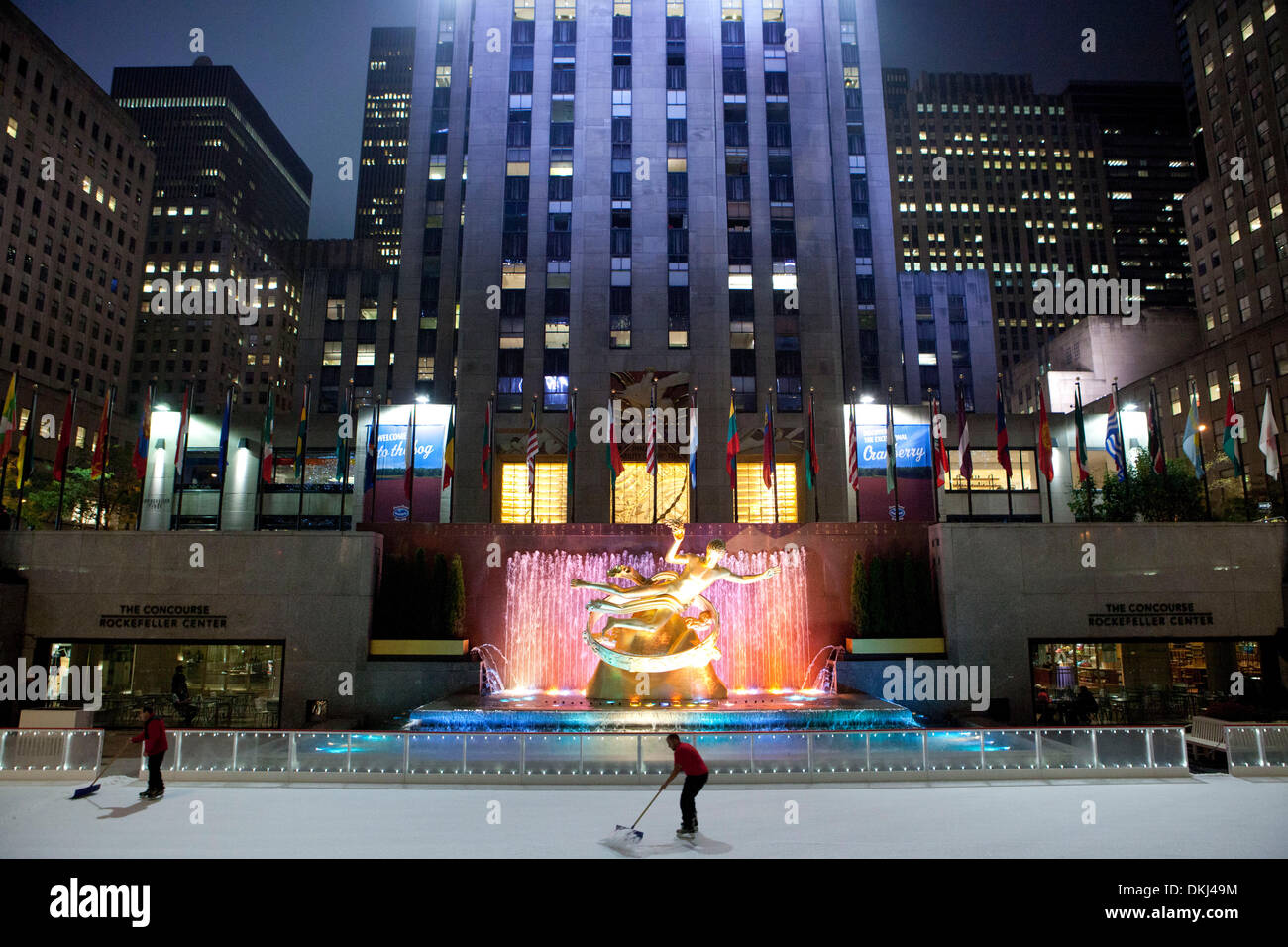 Employees prepare the ice at the Rockefeller Center's outdoor ice ...