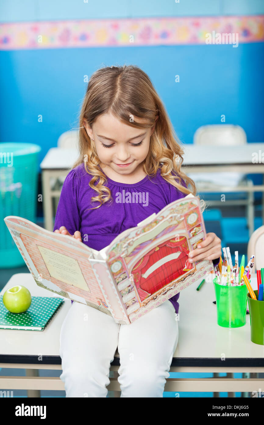 Girl Reading Book Stock Photo - Alamy