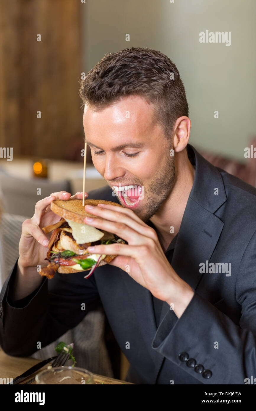 Man eating dinner suit hi-res stock photography and images - Alamy