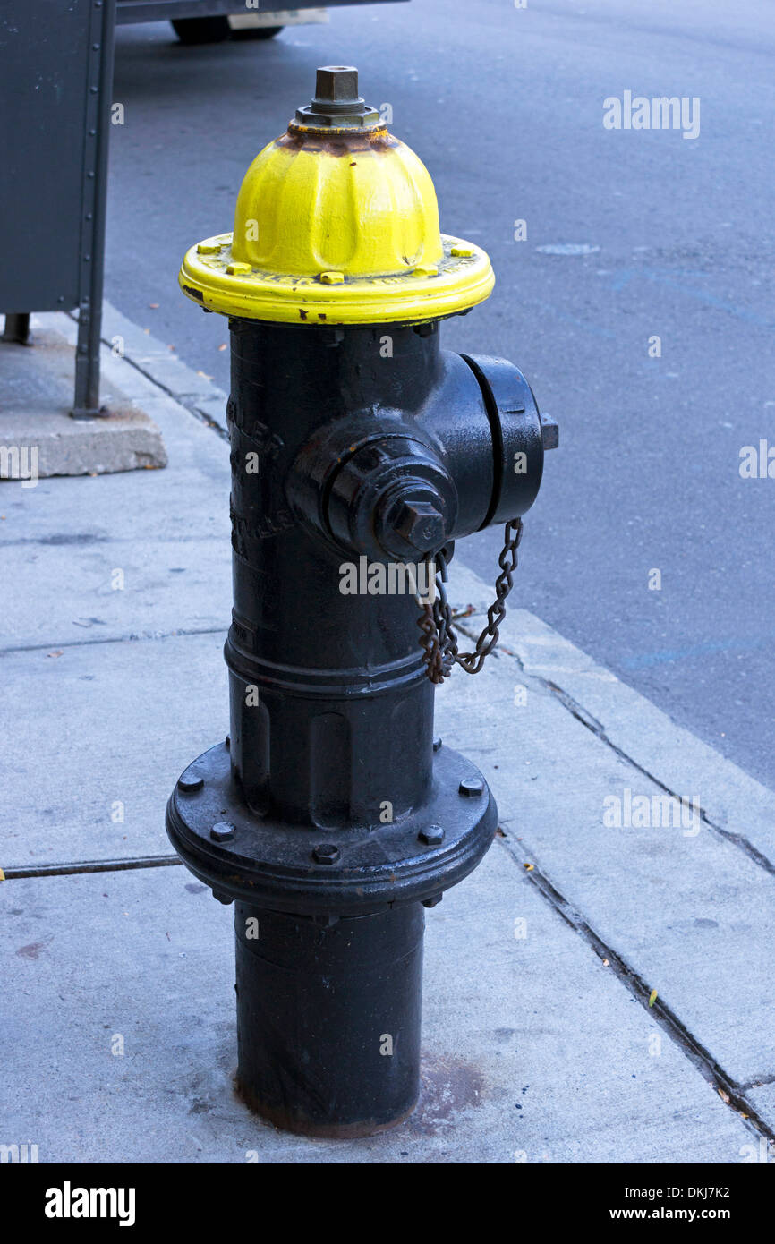 Fire Hydrant Pavement Yellow Stock Photos & Fire Hydrant Pavement ...