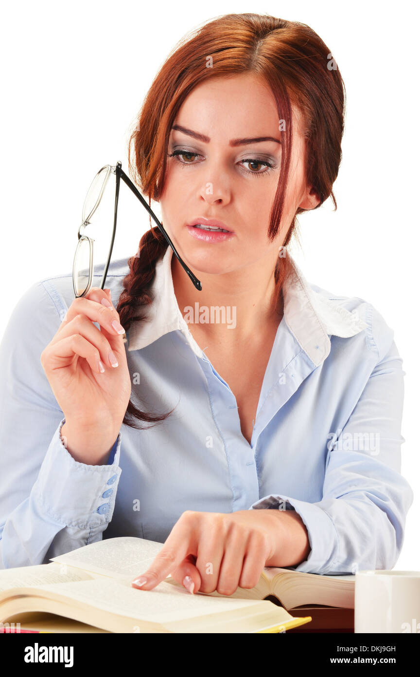 Young woman reading a book. Female student learning Stock Photo - Alamy
