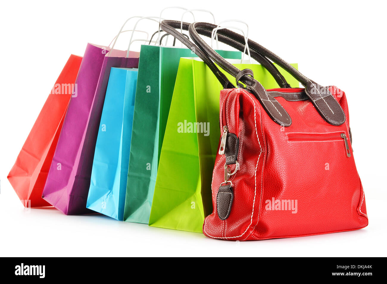 Composition with shopping bas isolated on white Stock Photo - Alamy