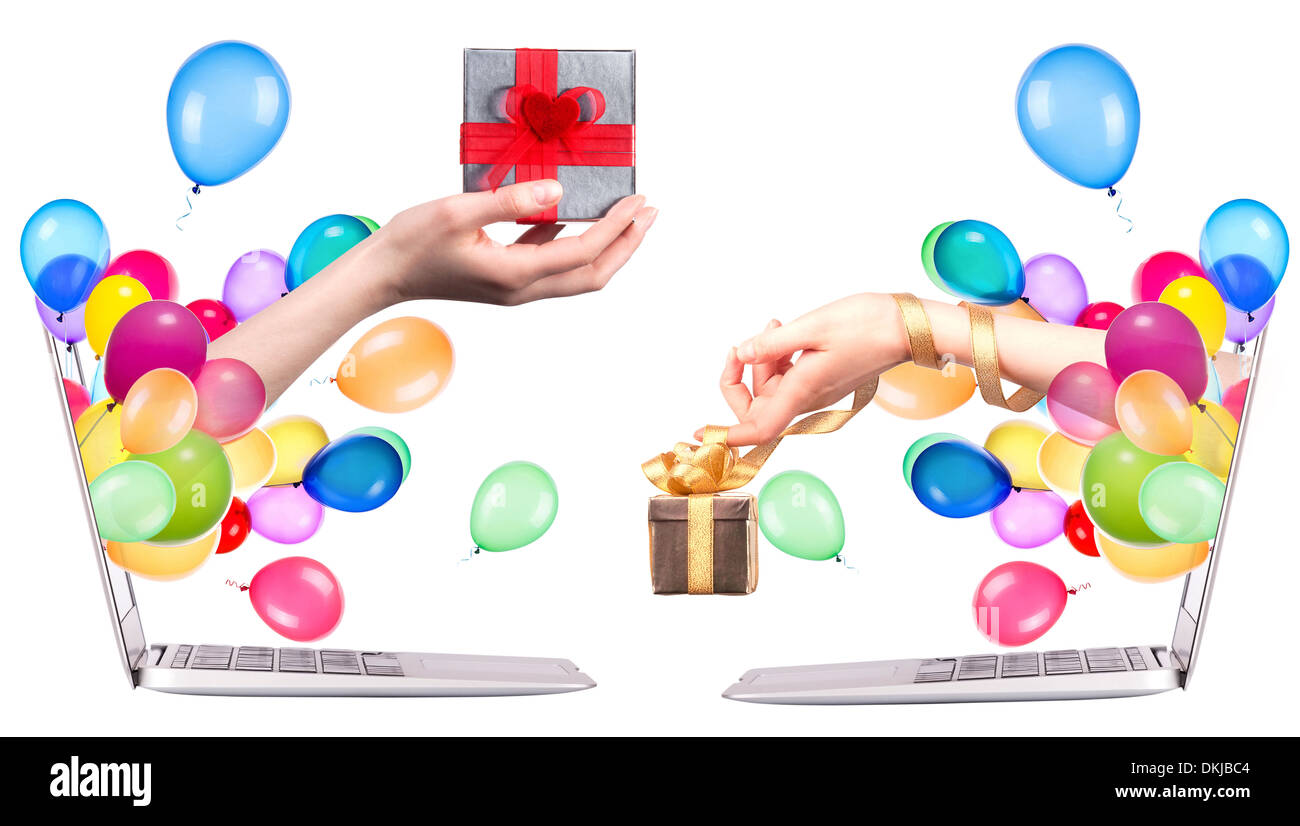 hand with a gift and balloons come out from a screen of a laptop ...