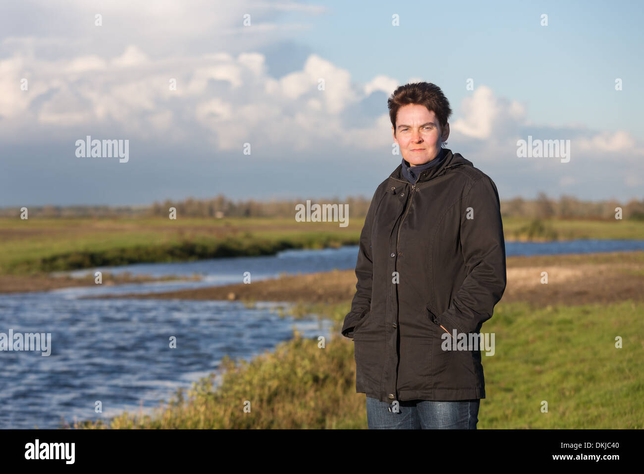 Woman in a beautiful wetland landscape in the Netherlands Stock Photo ...