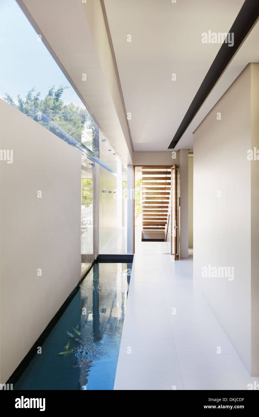 Pool and corridor of modern house Stock Photo - Alamy
