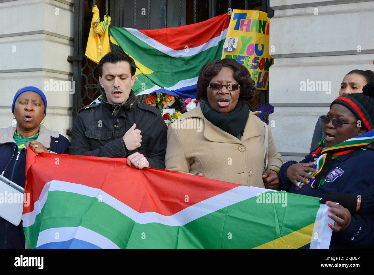London Uk 06th Dec 2013 Mourners Sing The South African National