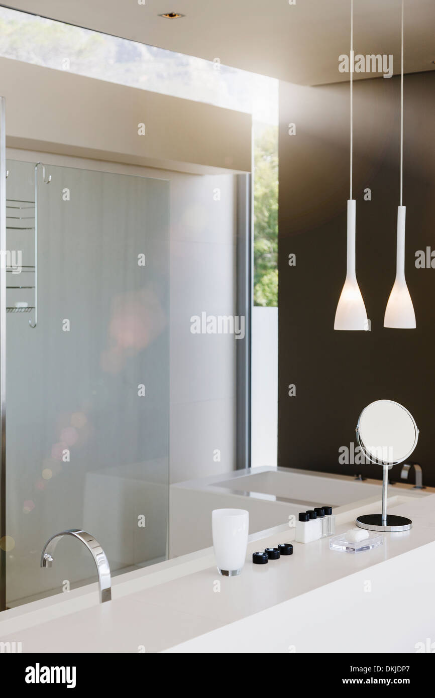 Sink and shower in modern bathroom Stock Photo - Alamy