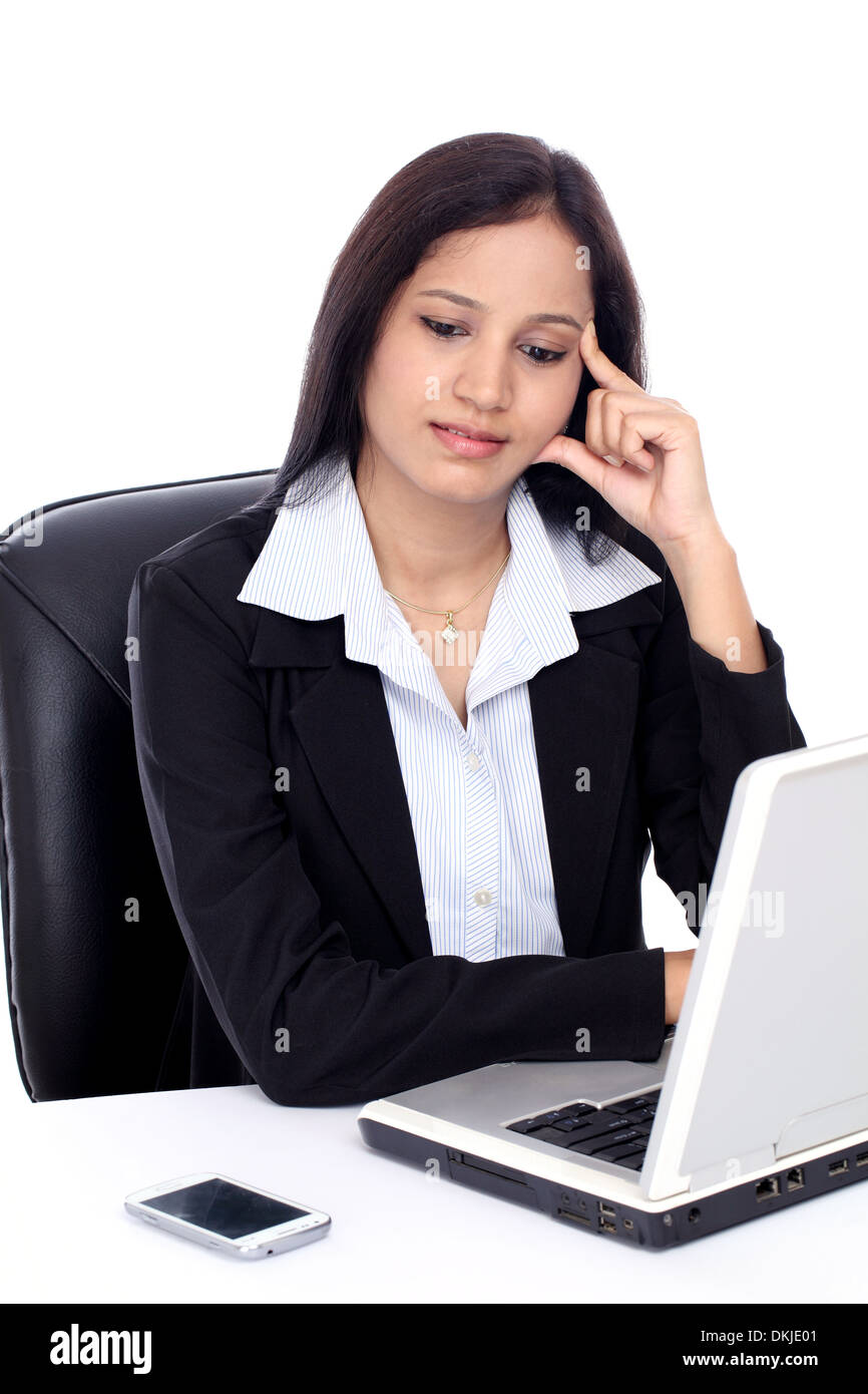 Young business woman thinking at office against white background Stock ...