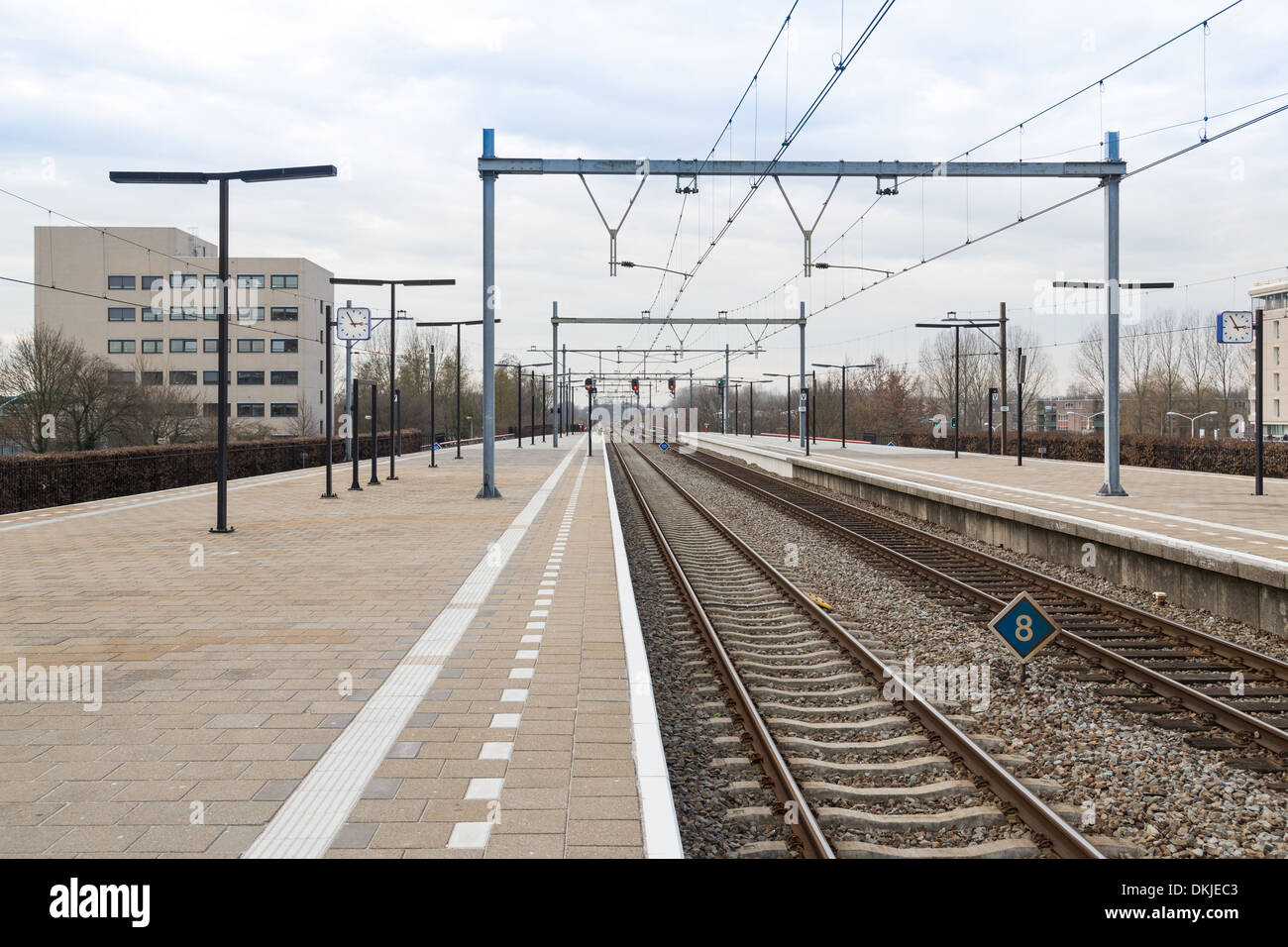 Platform railway station of Dutch city Almere Stock Photo - Alamy