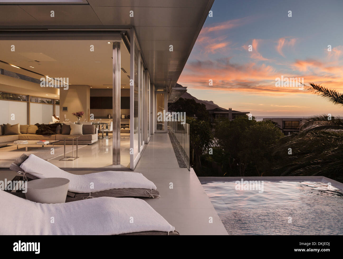 Sunset sky outside modern house Stock Photo - Alamy