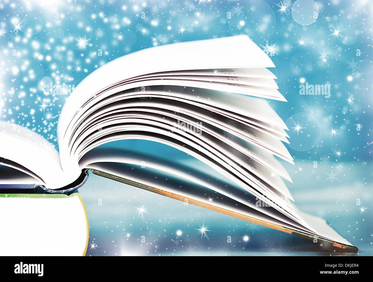 Oppen book in front of abstract background Stock Photo - Alamy