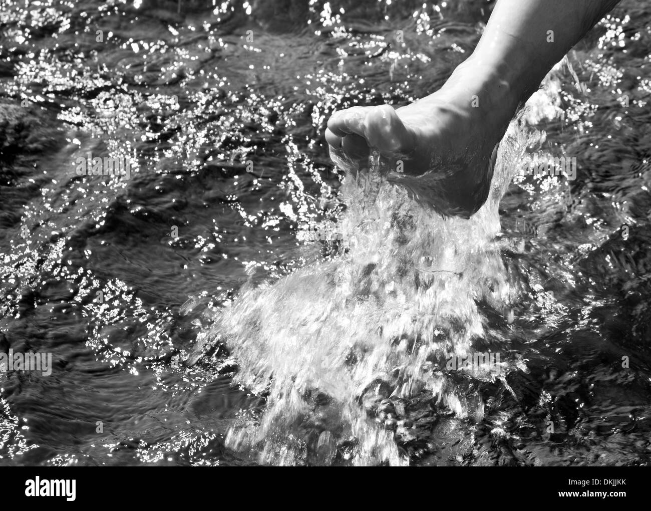 Black and White Foot Splash Stock Photo - Alamy