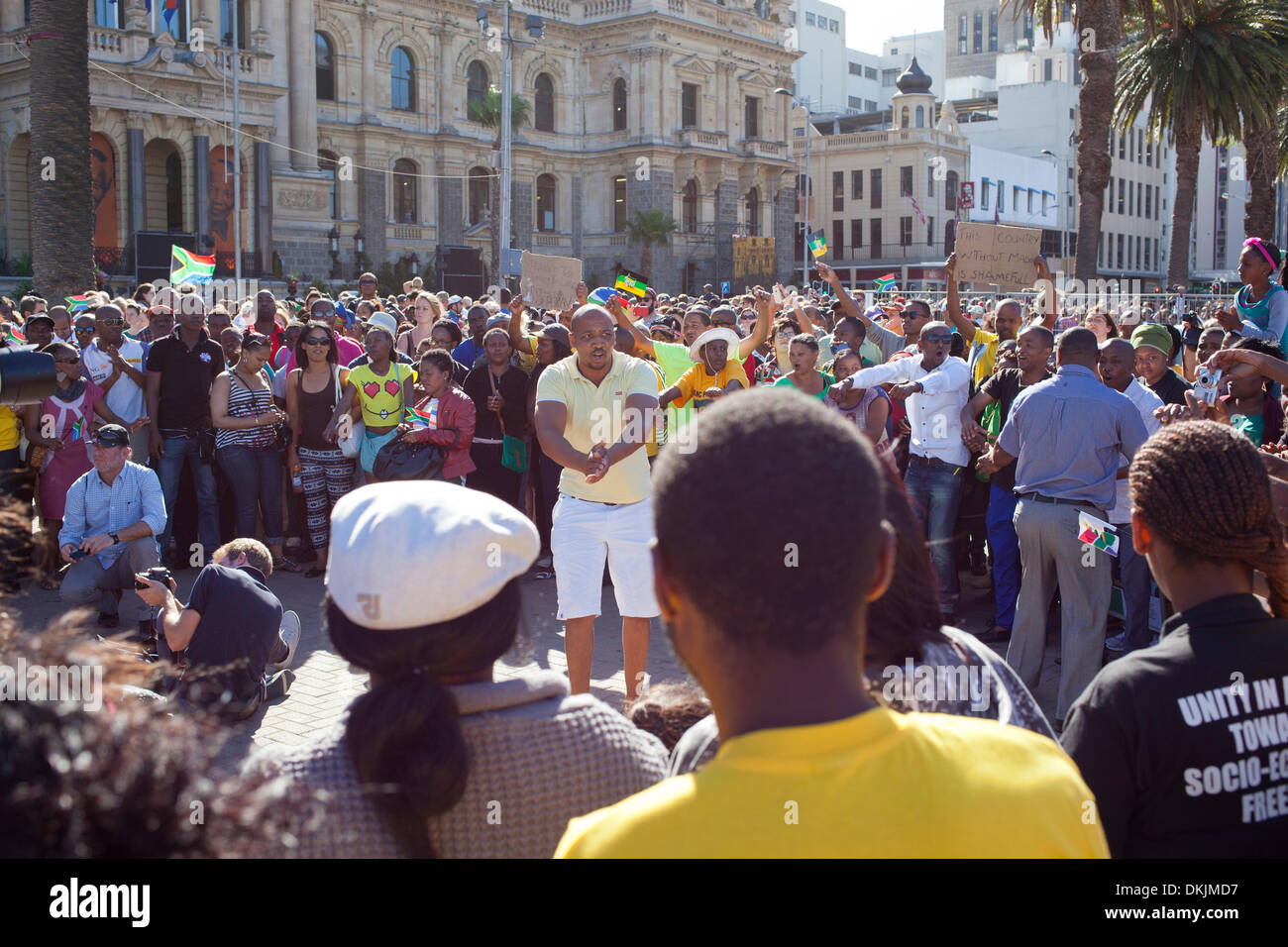Cape Town, South Africa. 6th Dec, 2013. South Africans gathered at the ...