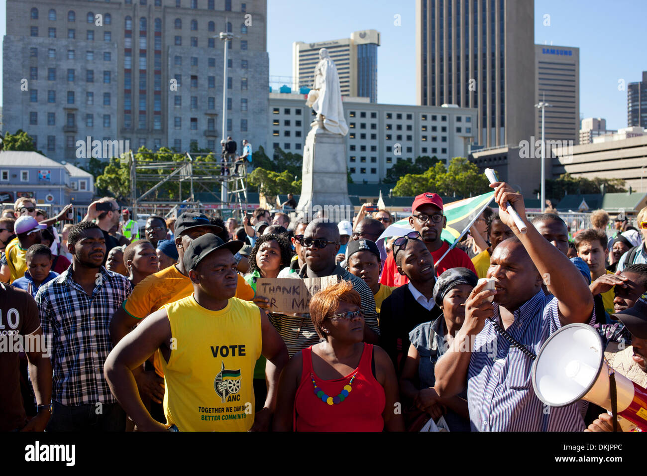 Cape Town, South Africa. 6th Dec, 2013. South Africans gathered at the ...