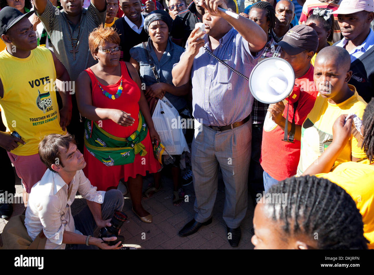 Cape Town, South Africa. 6th Dec, 2013. South Africans gathered at the ...