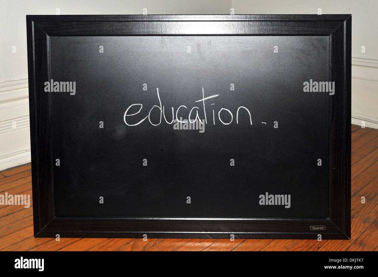 A blackboard with the word Education written on it in white chalk Stock ...