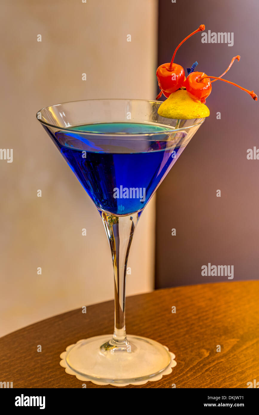 Cocktail with cherry and lemon Stock Photo - Alamy