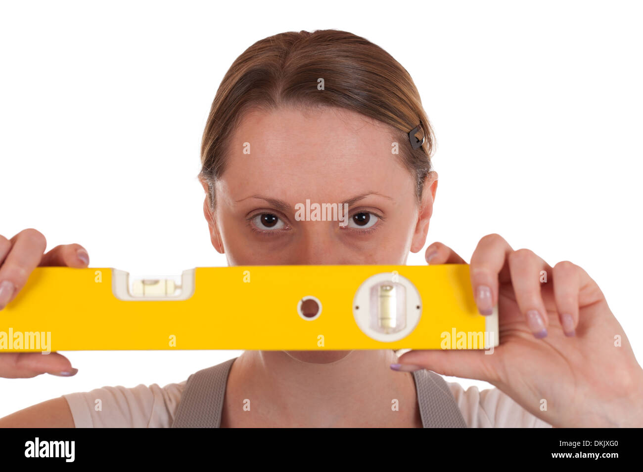 Construction worker is holding a level tool hi-res stock photography ...